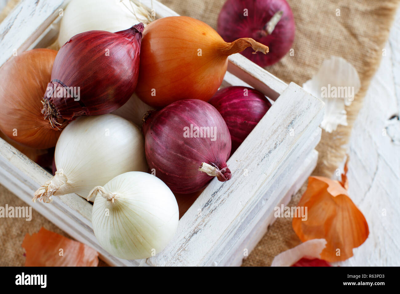 Raw onions in box Stock Photo - Alamy