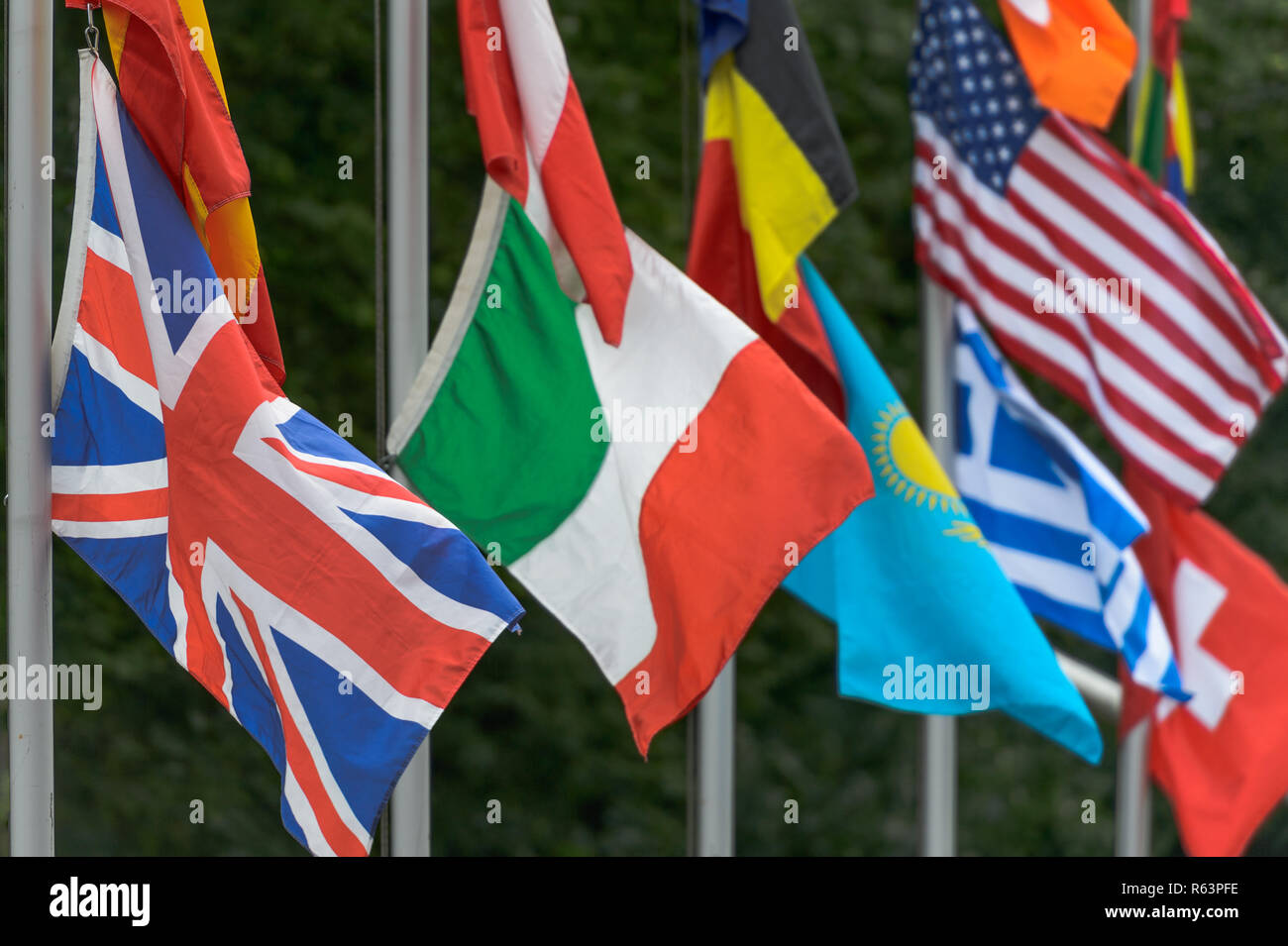 various national flags flutter in the wind Stock Photo - Alamy