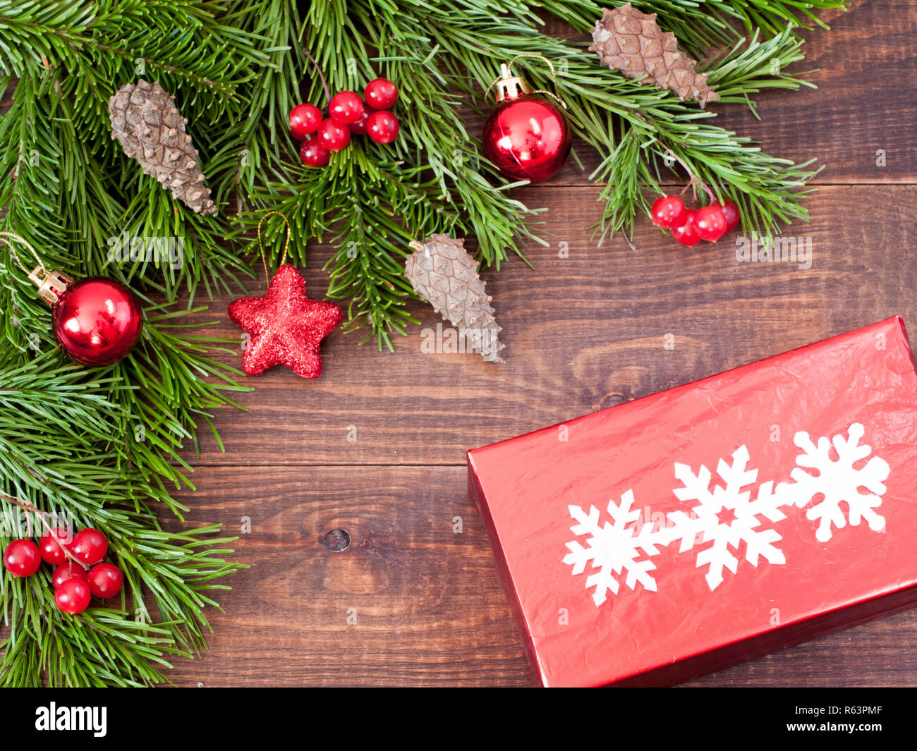 Christmas fir tree with decoration on wooden background Stock Photo - Alamy