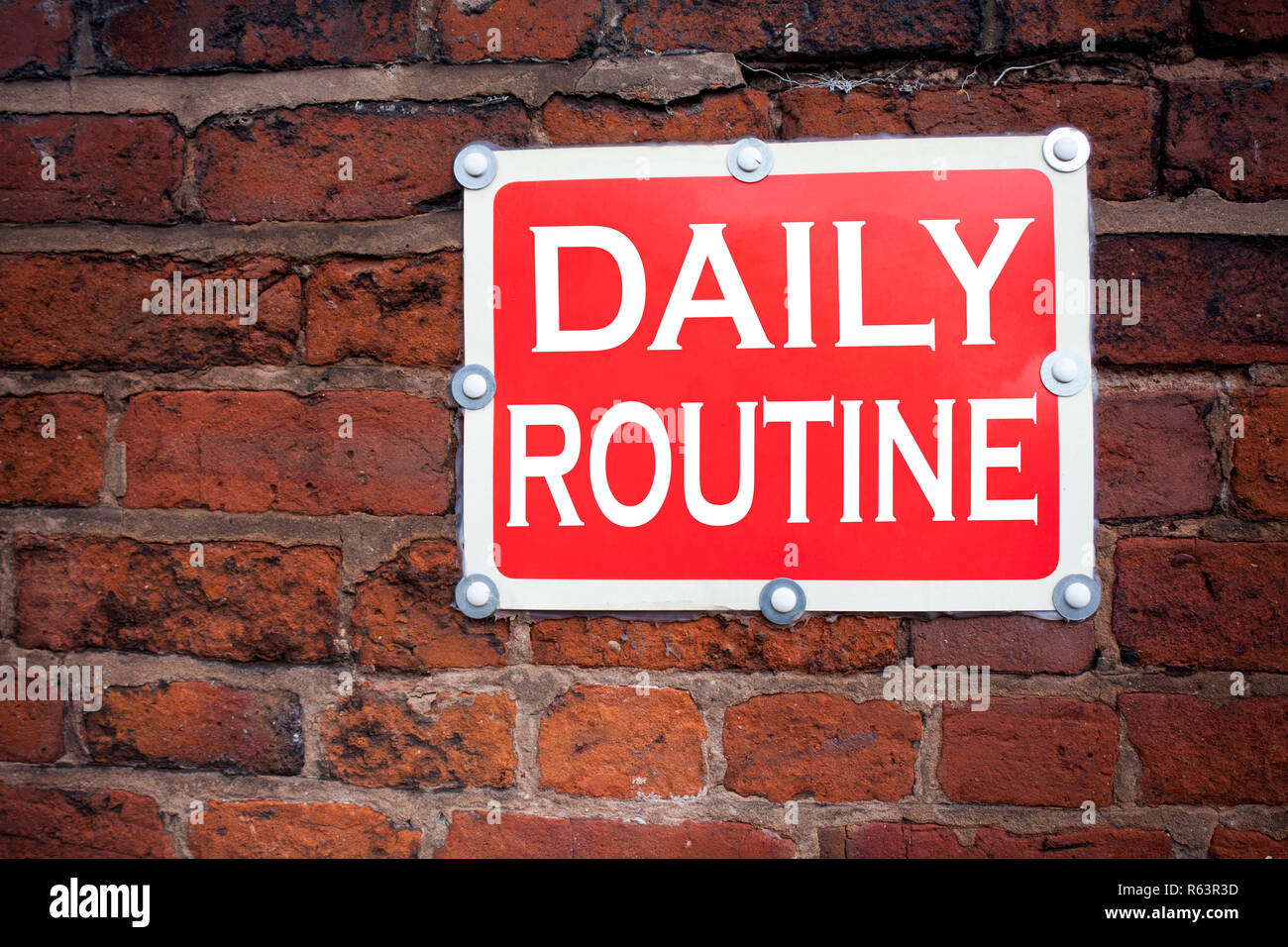 Hand writing text caption inspiration showing Daily Routine concept ...