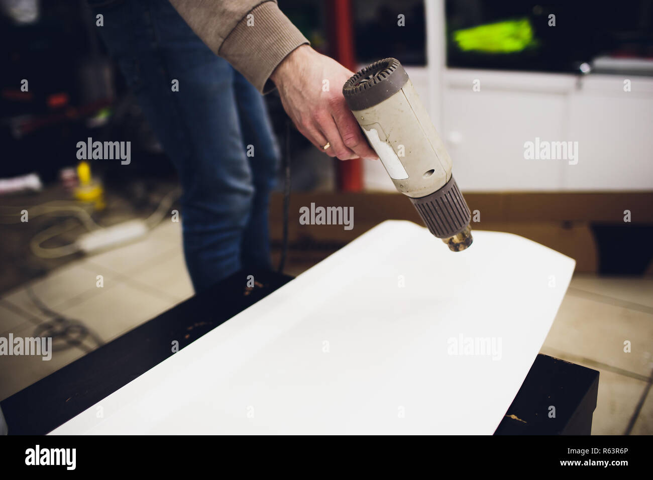 cleaning spoiler. preparation for painting, machine parts Stock Photo ...