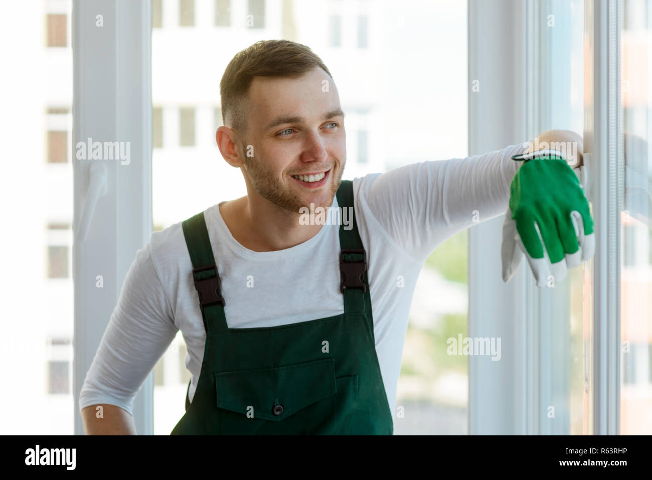 Handsome man in builder uniform Stock Photo - Alamy