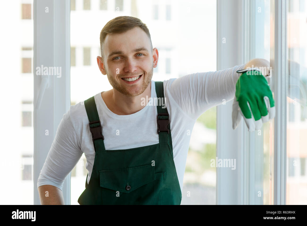 Portrait of a happy worker Stock Photo - Alamy