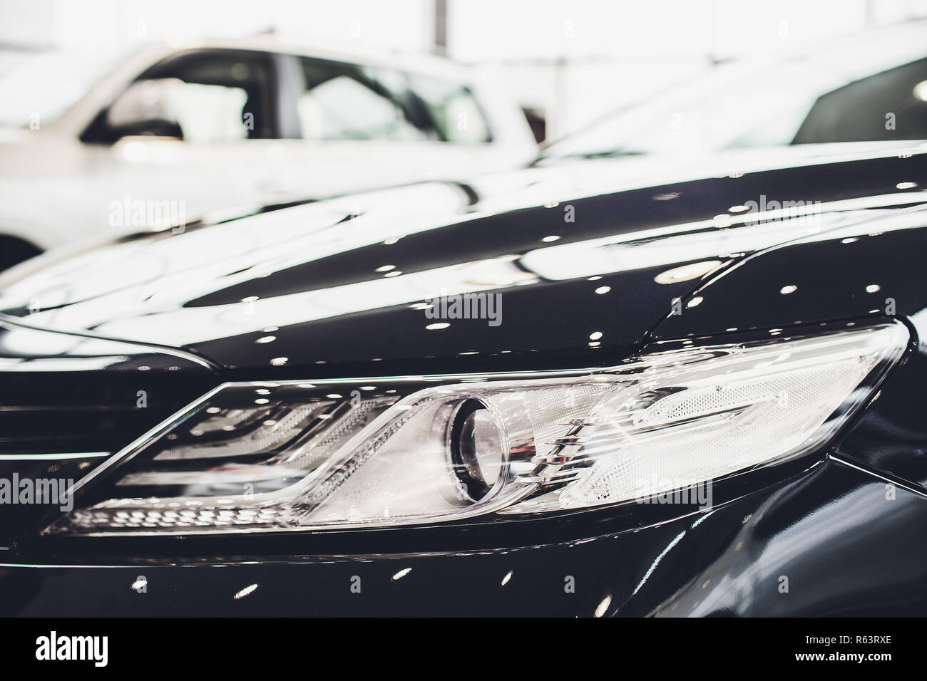 front headlight, with shiny reflections auto black body Stock Photo - Alamy