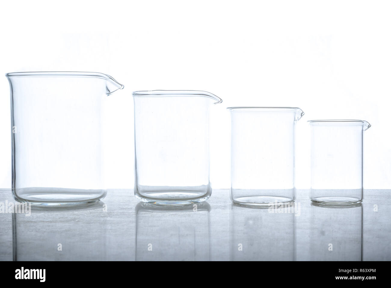 Empty glass beakers used in chemistry experiments Stock Photo - Alamy