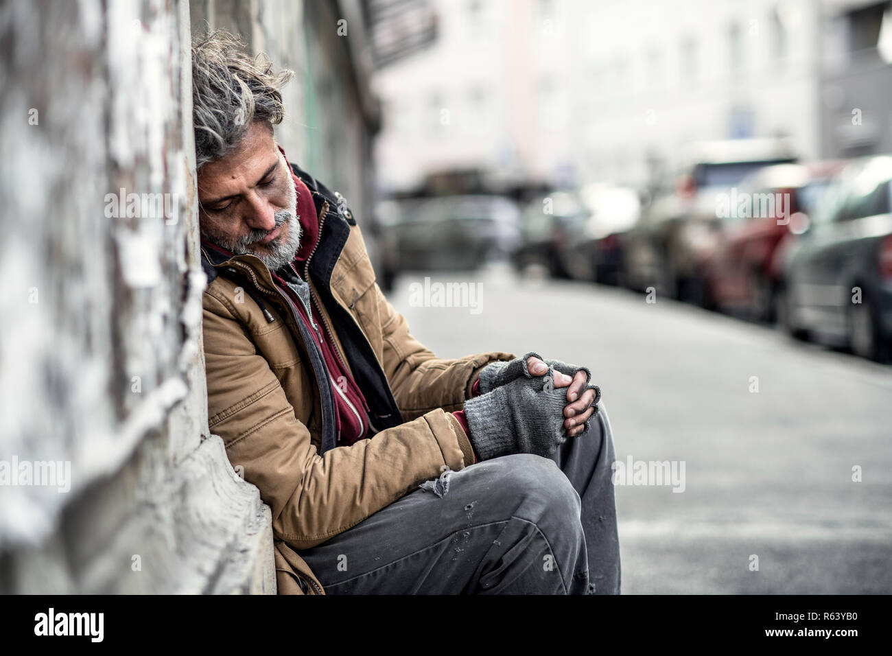 Homeless man asking for money hi-res stock photography and images - Alamy