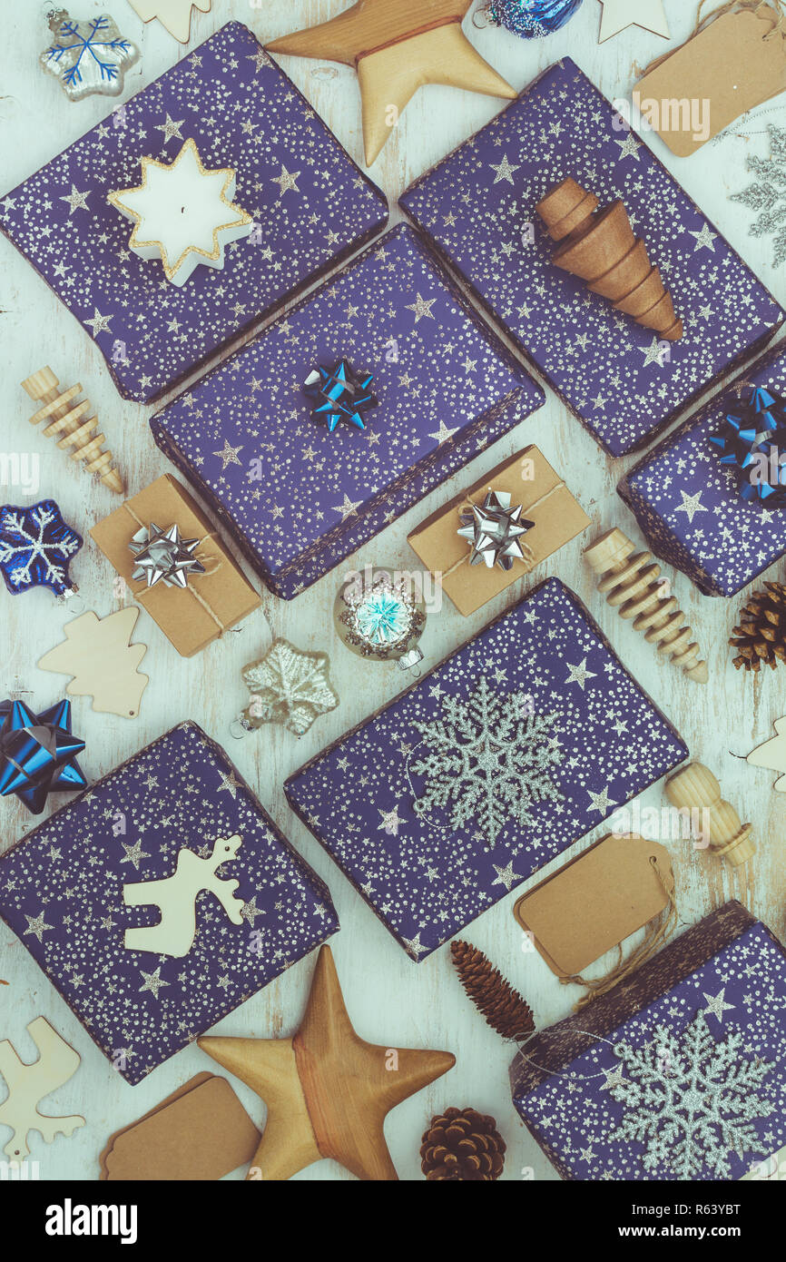 Creative chritmas composition. Presents in blue wrapping paper with ...