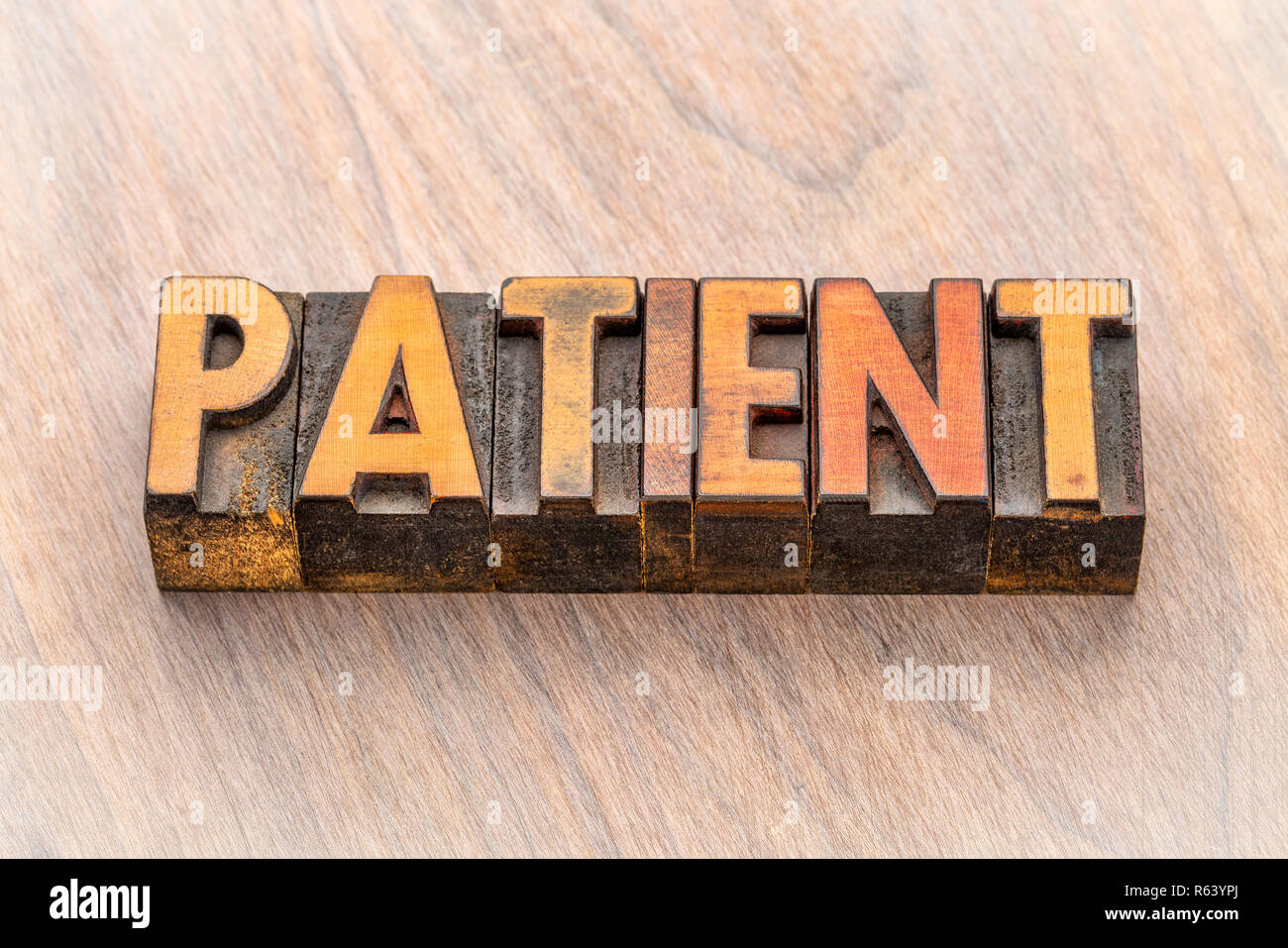 patient word in vintage letterpress wood type blocks Stock Photo - Alamy