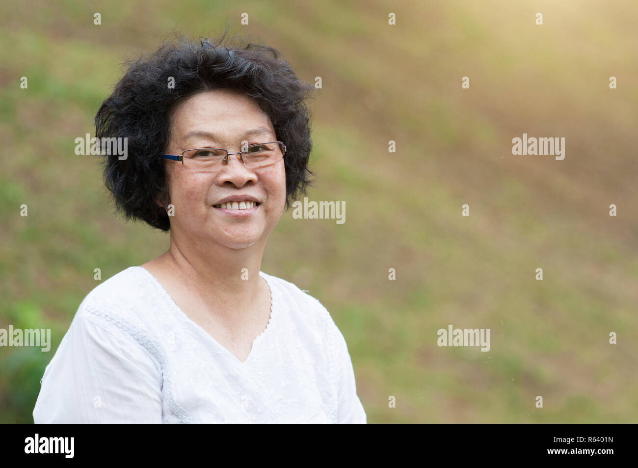 Healthy older chinese woman laughing hi-res stock photography and ...