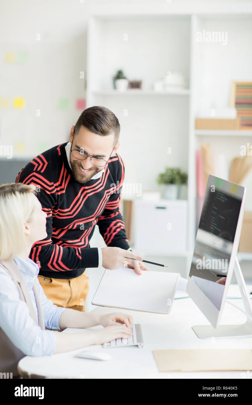 Woman programmer smiling hi-res stock photography and images - Alamy