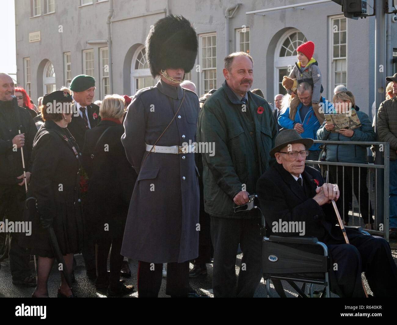 A bear skin hat is worn by a soldier from one of the Foot Guards ...