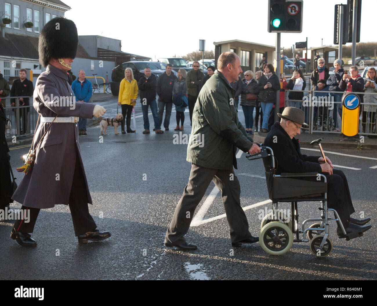 A bear skin hat is worn by a soldier from one of the Foot Guards ...