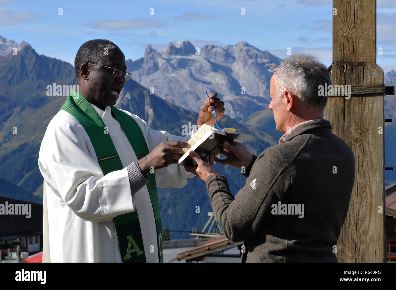 Religious mountain ceremony on Hochfirst above Schruns city in Montafon ...