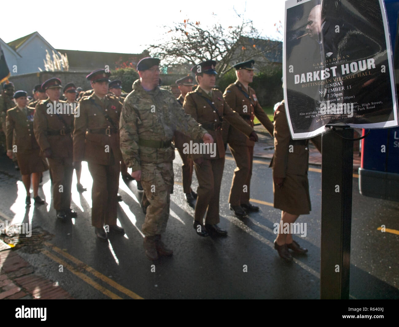 On Remembrance Day in the village of Rottingdean soldiers march past a ...