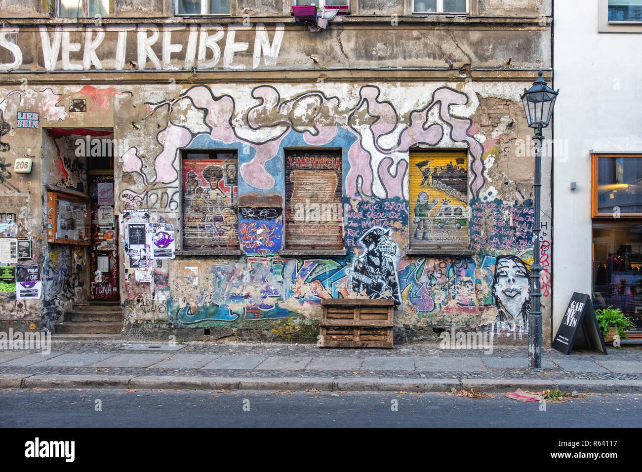 Berlin Mitte, Linienstrasse 206. Dilapidated Squat building covered in ...