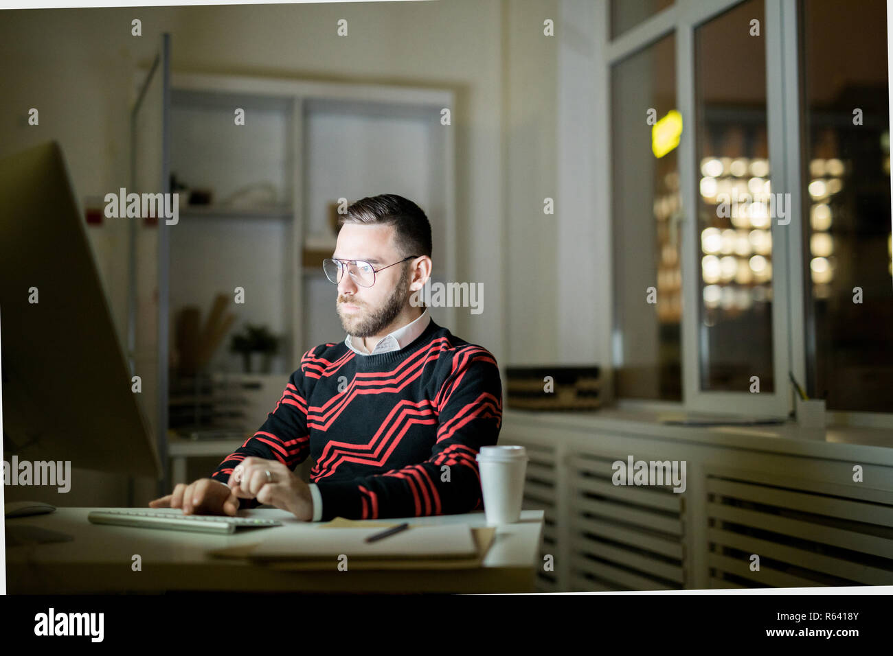 Business people working late in hi-res stock photography and images - Alamy