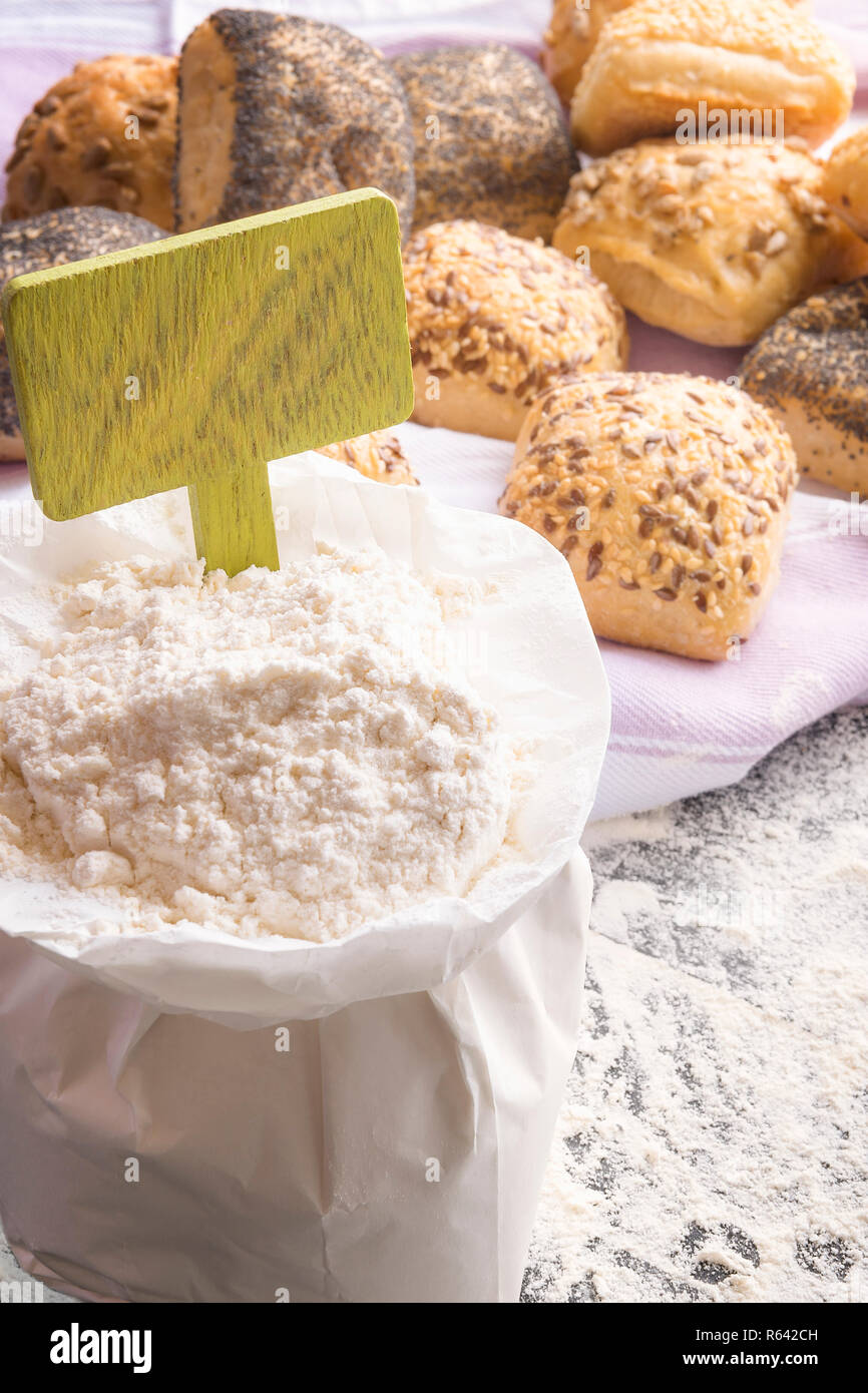 Open flour bag and a banner Stock Photo - Alamy