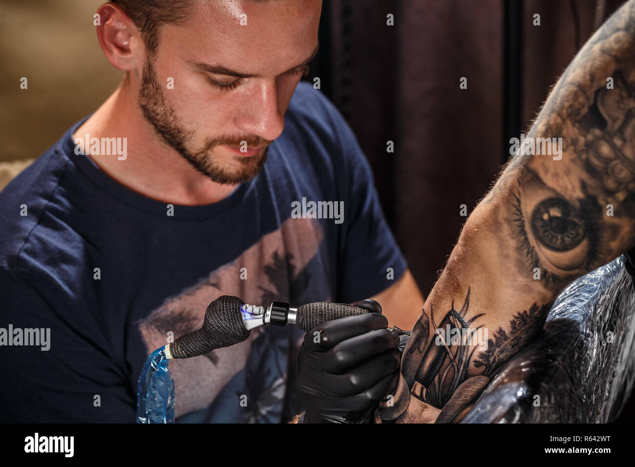 Close hand tatoo tool hi-res stock photography and images - Alamy