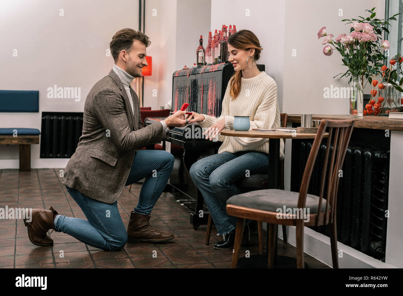 Man making a proposal to his girlfriend Stock Photo - Alamy