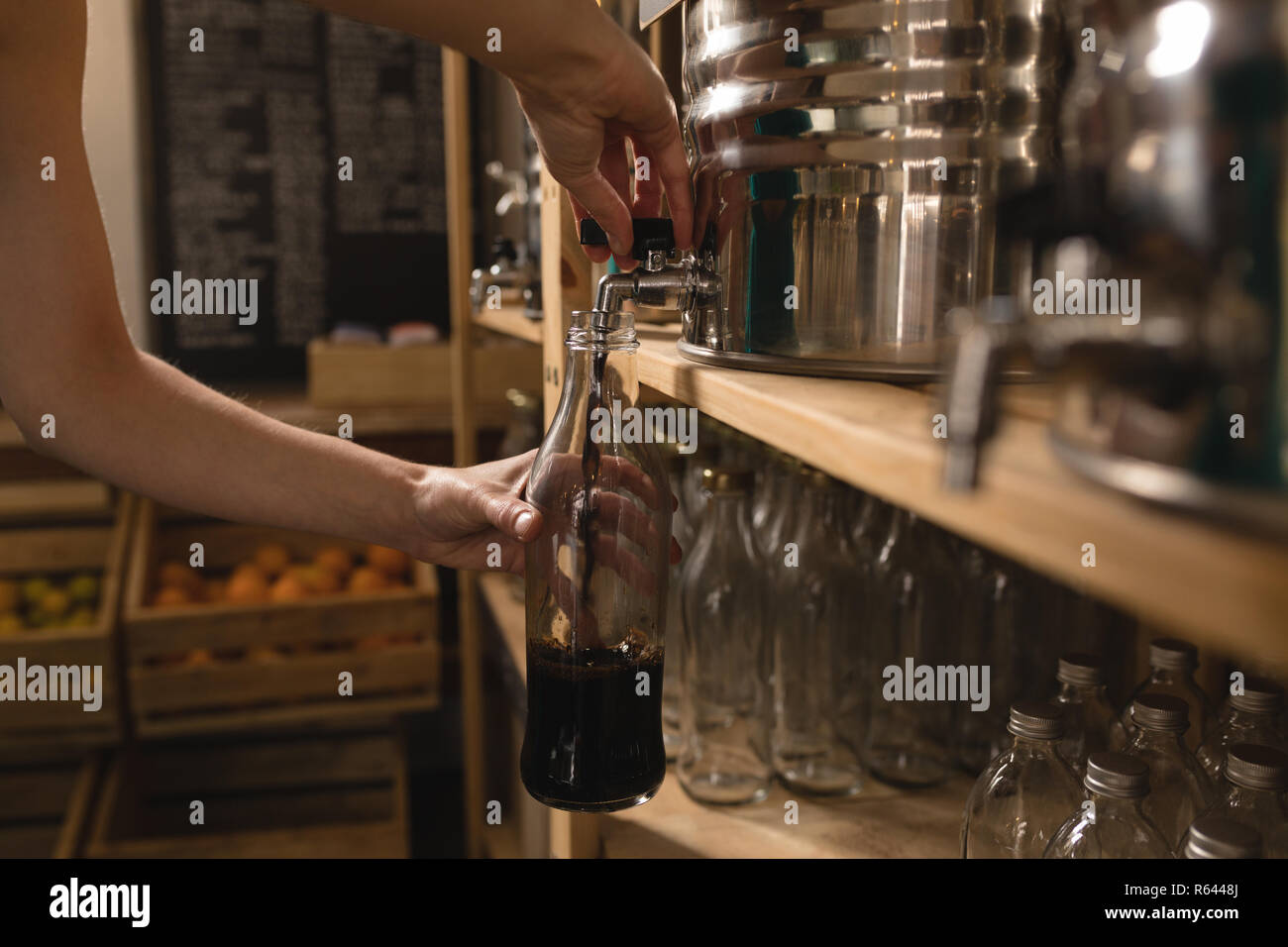 Filling up bottle hi-res stock photography and images - Alamy