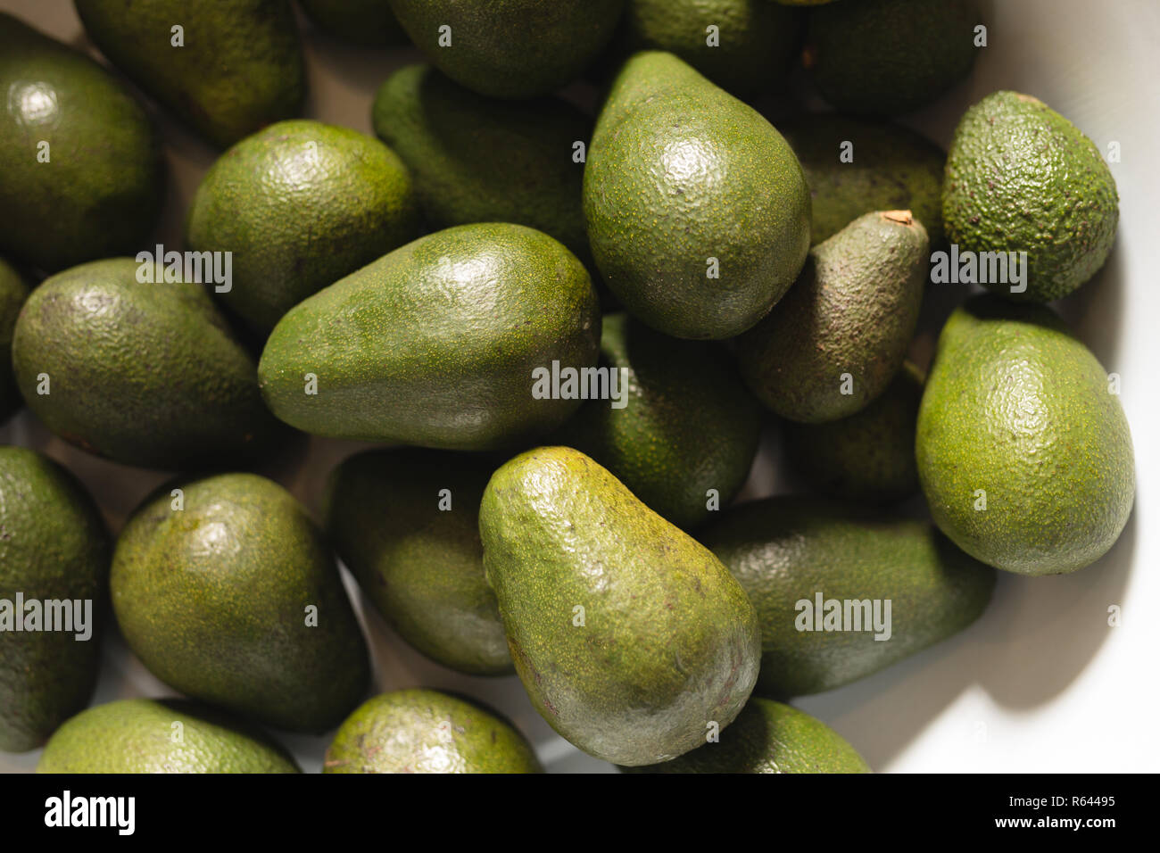 Avocado fruits in basket at supermarket Stock Photo - Alamy