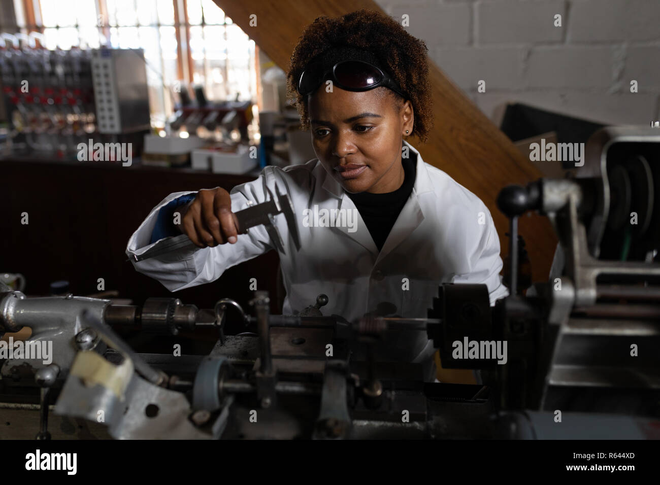 Worker working in glass factory Stock Photo - Alamy