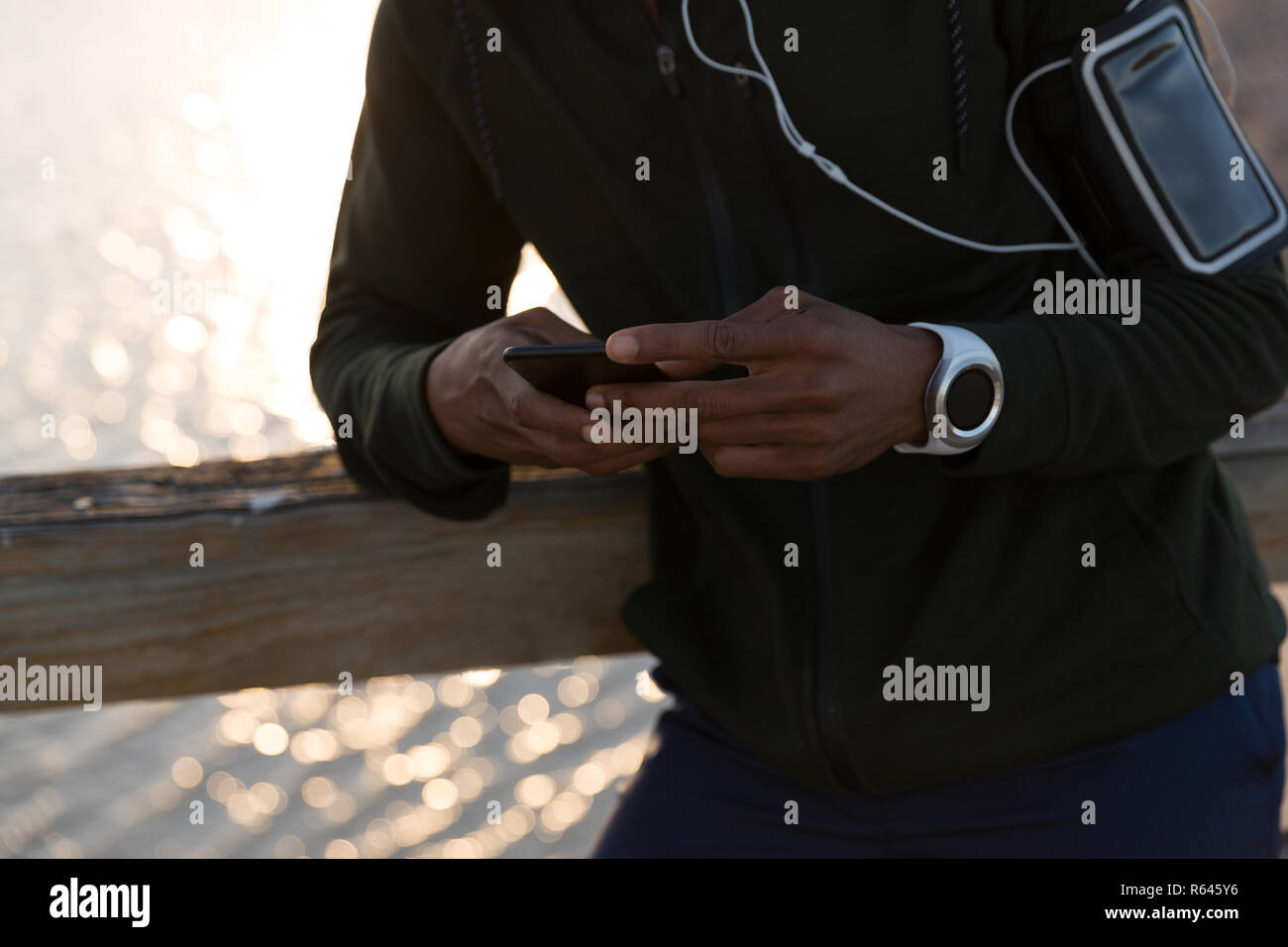 Mobile phone on arm hi-res stock photography and images - Alamy