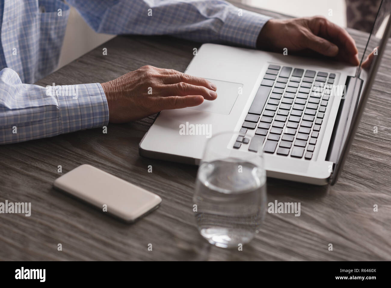 Smart phone laptop at dining table hi-res stock photography and images ...