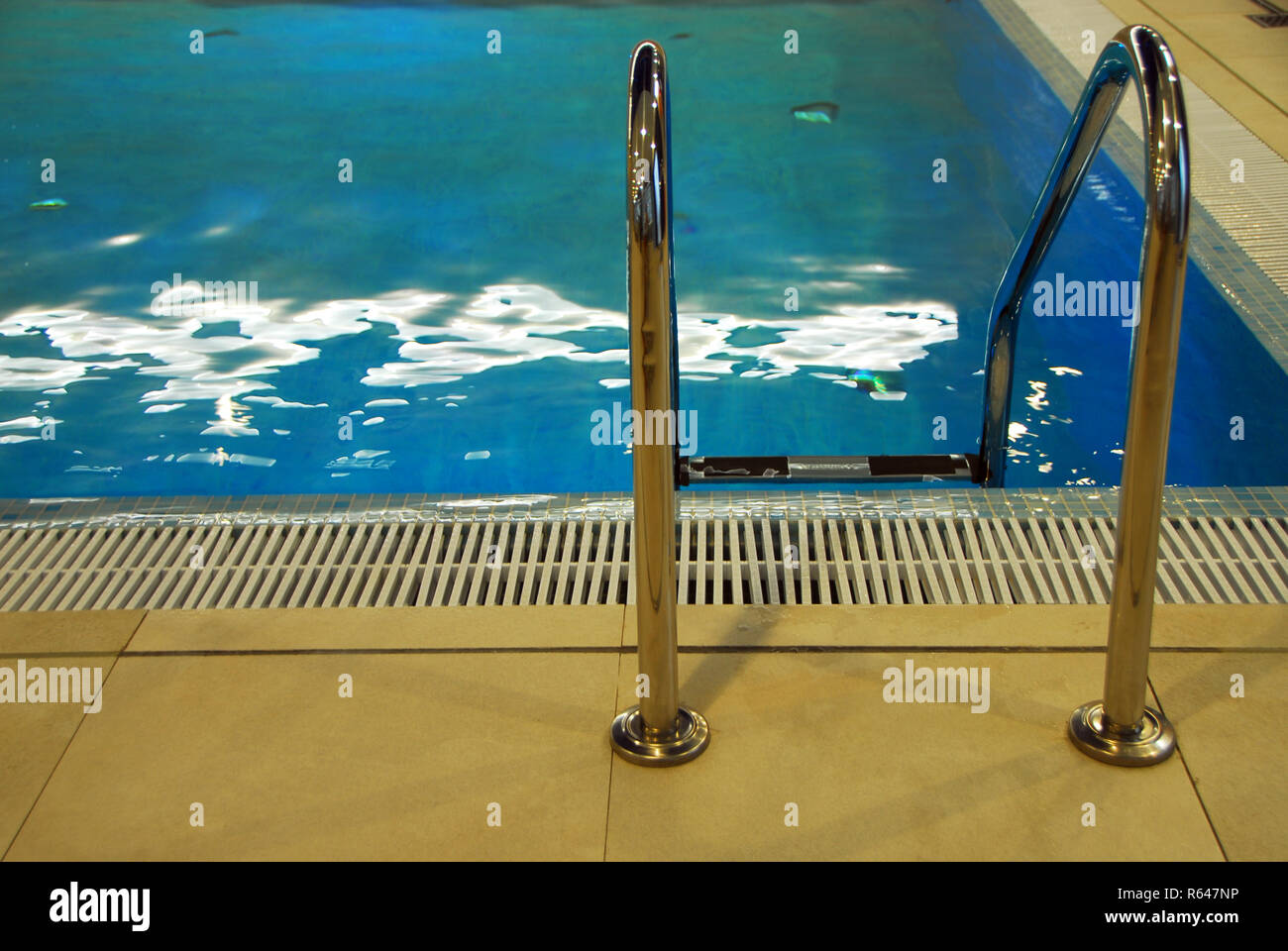 swimming pool ladder Stock Photo - Alamy
