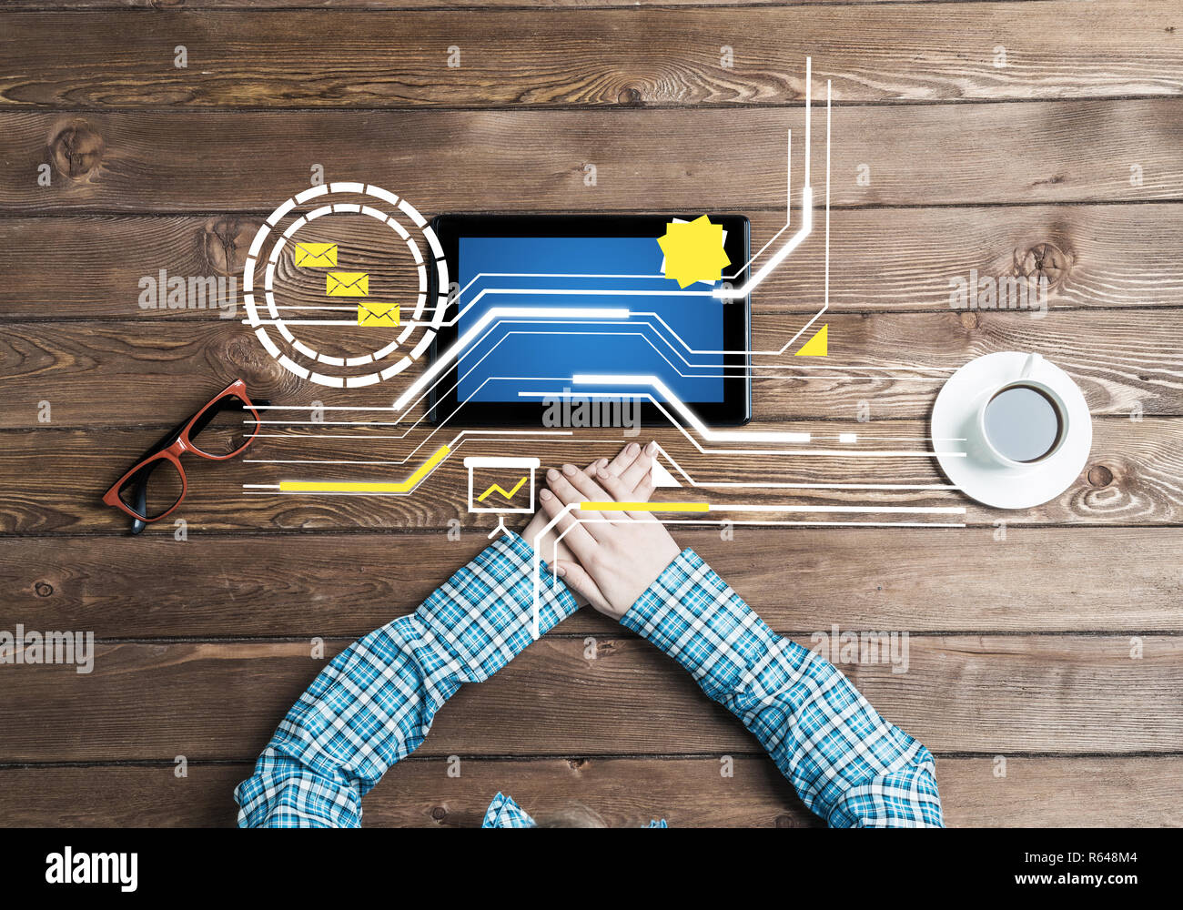 Business workplace with tablet device coffee cup and media graphs and ...