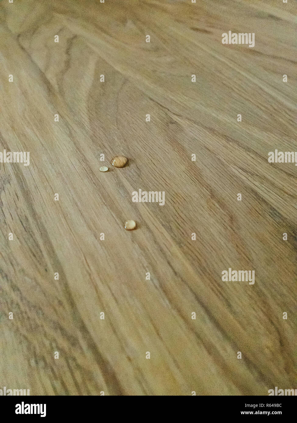 Water drops on natural wood table top Stock Photo - Alamy