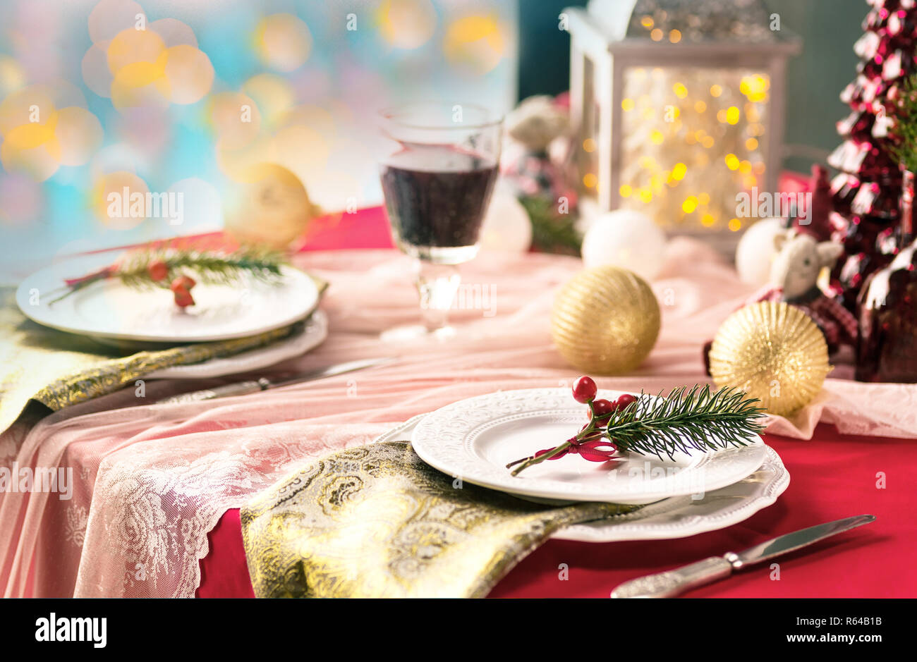 Beautiful Christmas table setting with decorations Stock Photo - Alamy