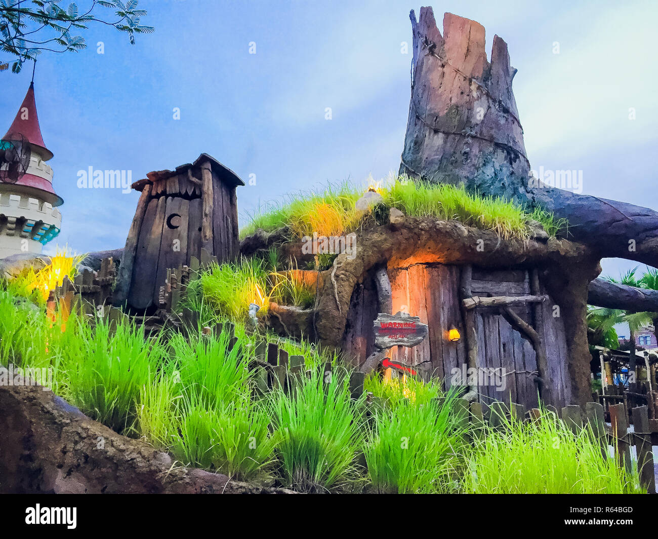 SINGAPORE - APRIL 11: Beautiful castle and roller coaster in Universal ...