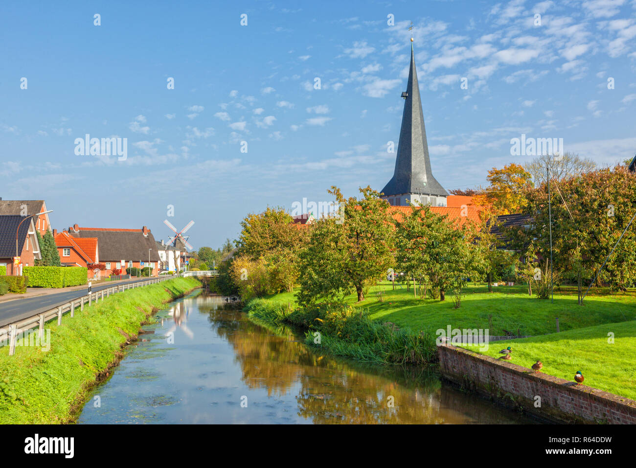 Canal through the village of Jork, Altes Land region, Lower Saxony ...