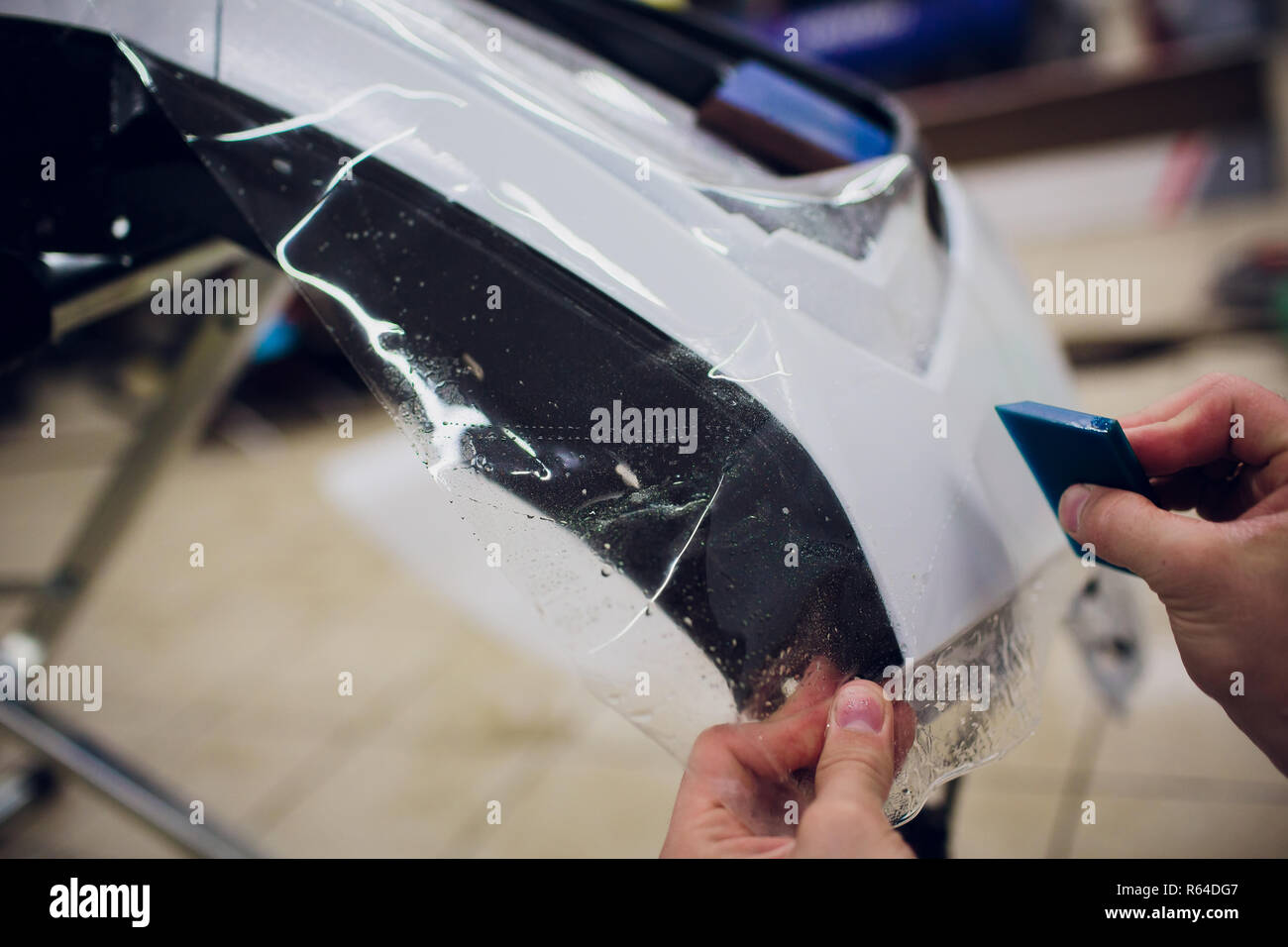 Car paint protection, protect coating installation Stock Photo - Alamy