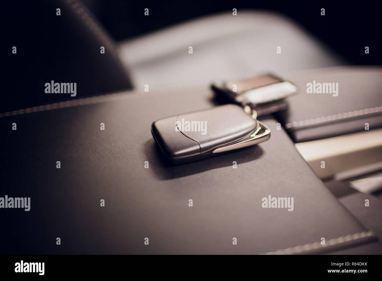 Passing car keys. Cropped closeup car dealer holding out car keys ...