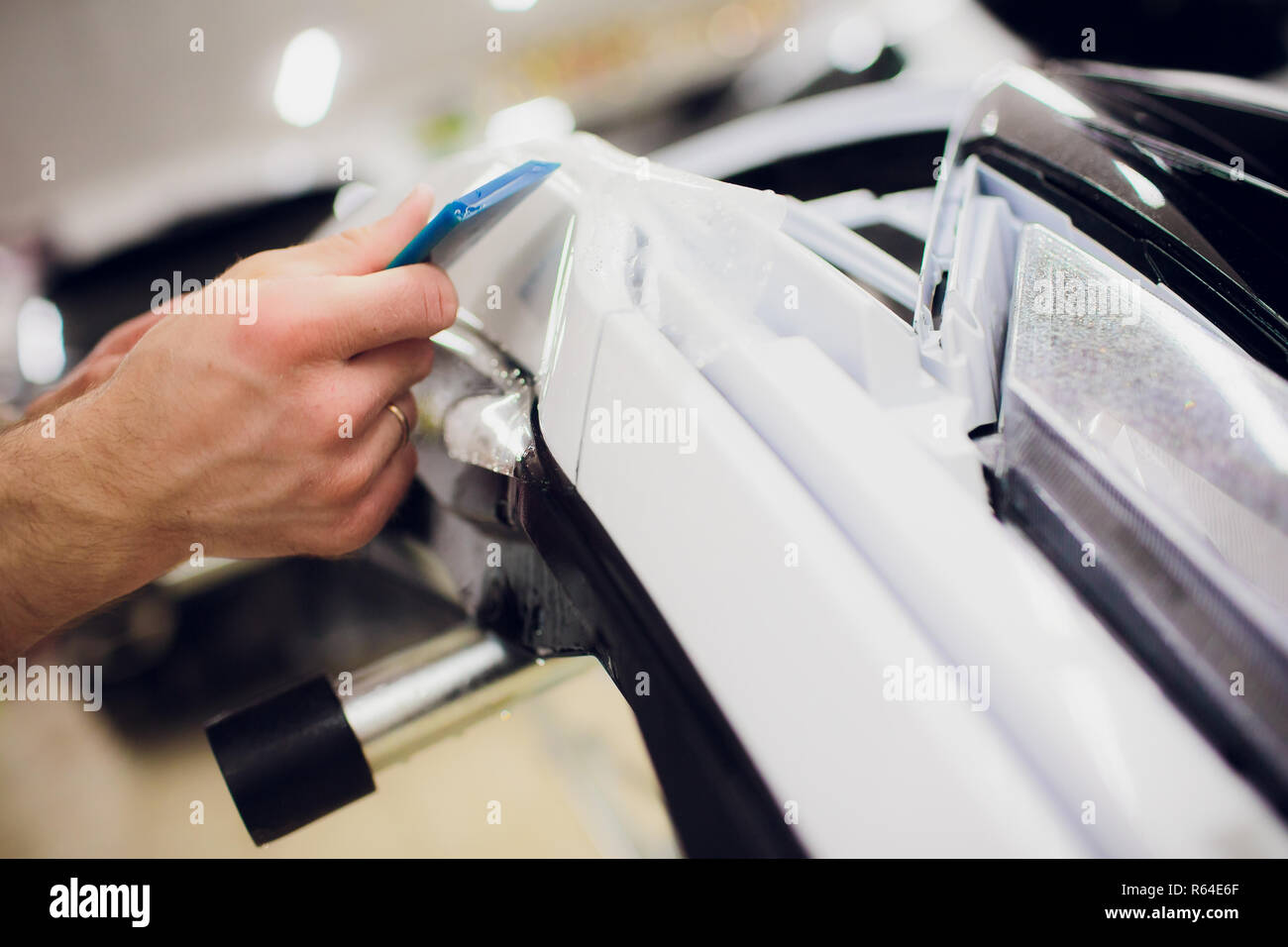 Car paint protection, protect coating installation Stock Photo - Alamy