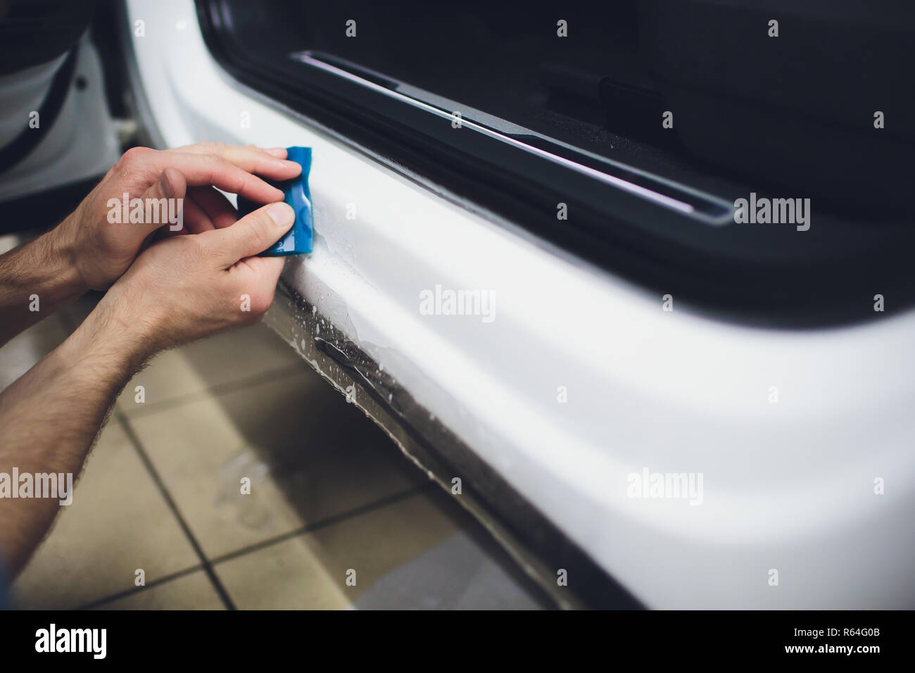 Car paint protection, protect coating installation Stock Photo - Alamy