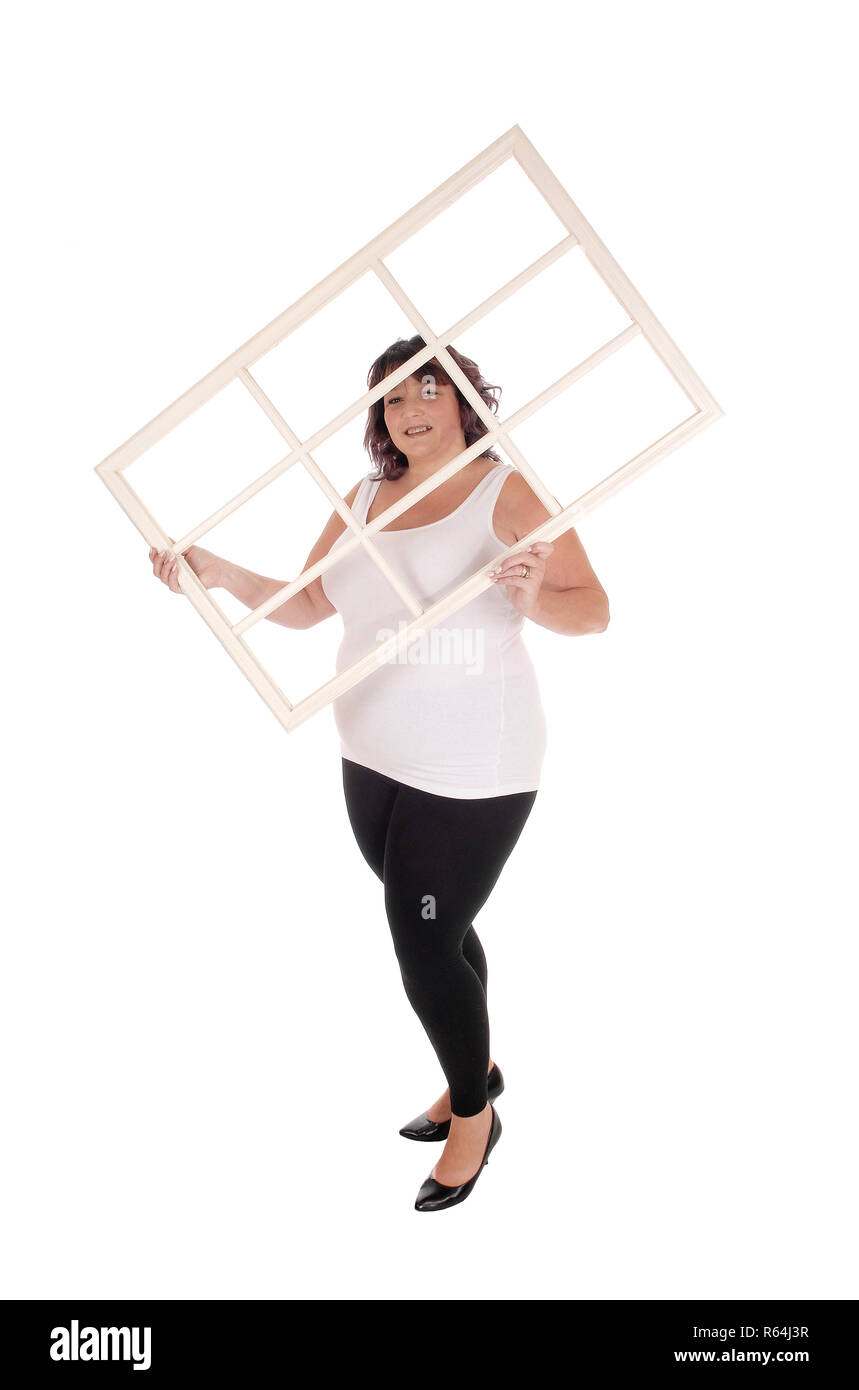 Big woman holding window frame Stock Photo - Alamy