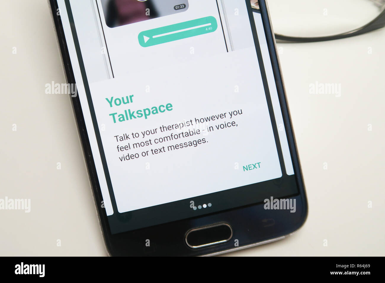 Image of the Talkspace app on a smartphone showing Your talkspace ...