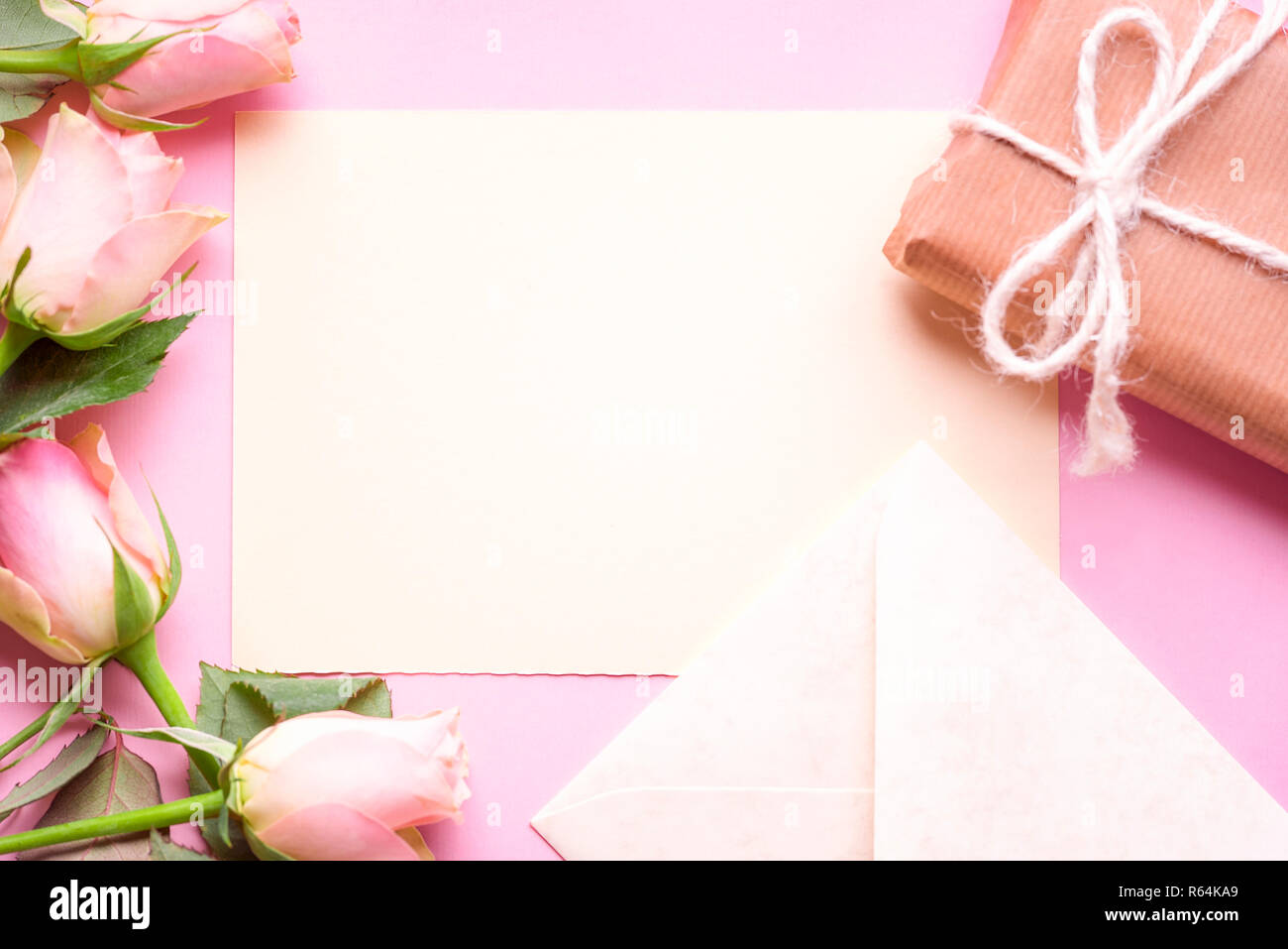Message card with flowers and gift Stock Photo - Alamy