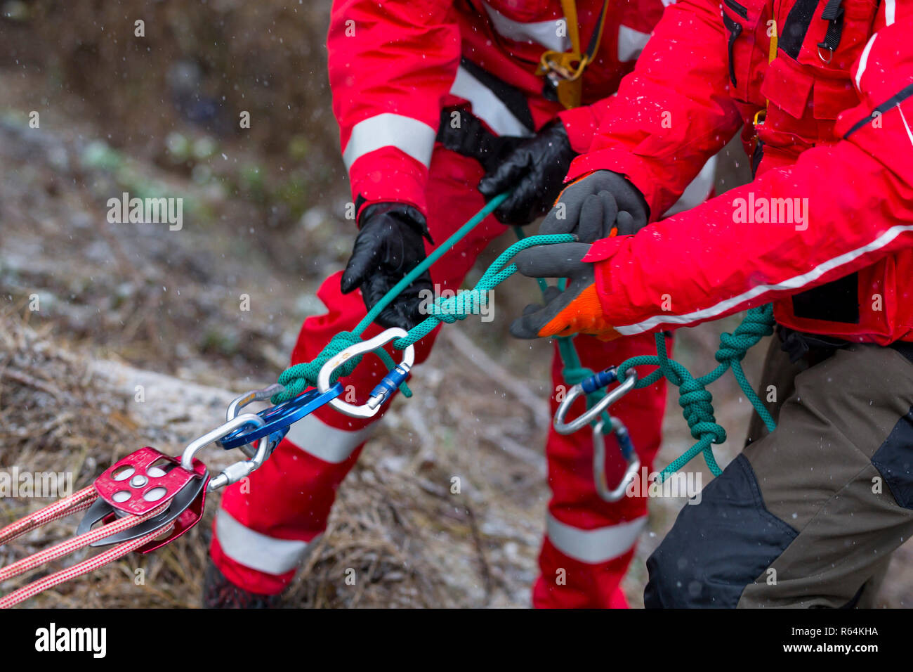 Paramedics from mountain rescue service provide first aid during a ...