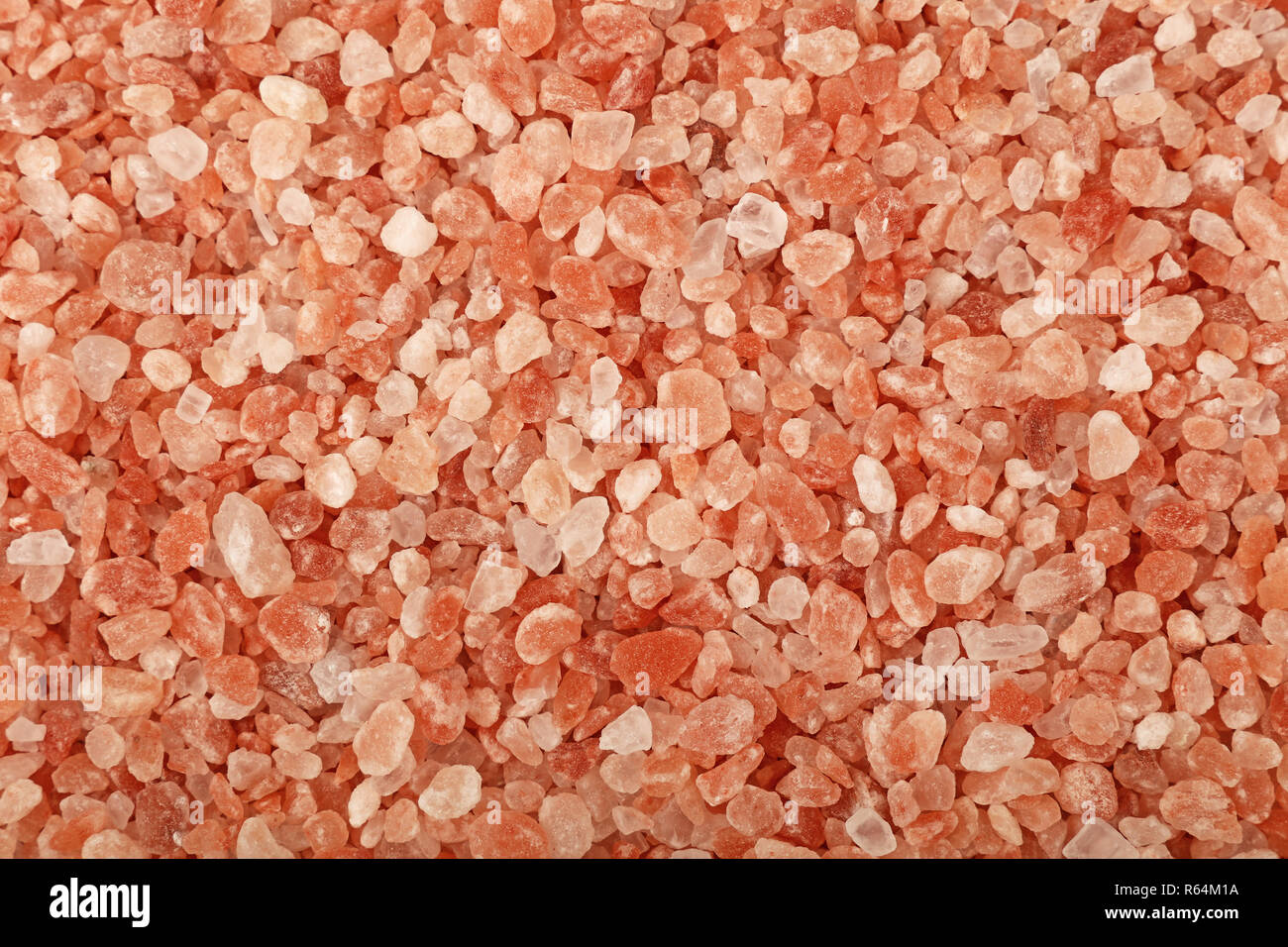 Close up background of pink Himalayan salt Stock Photo - Alamy