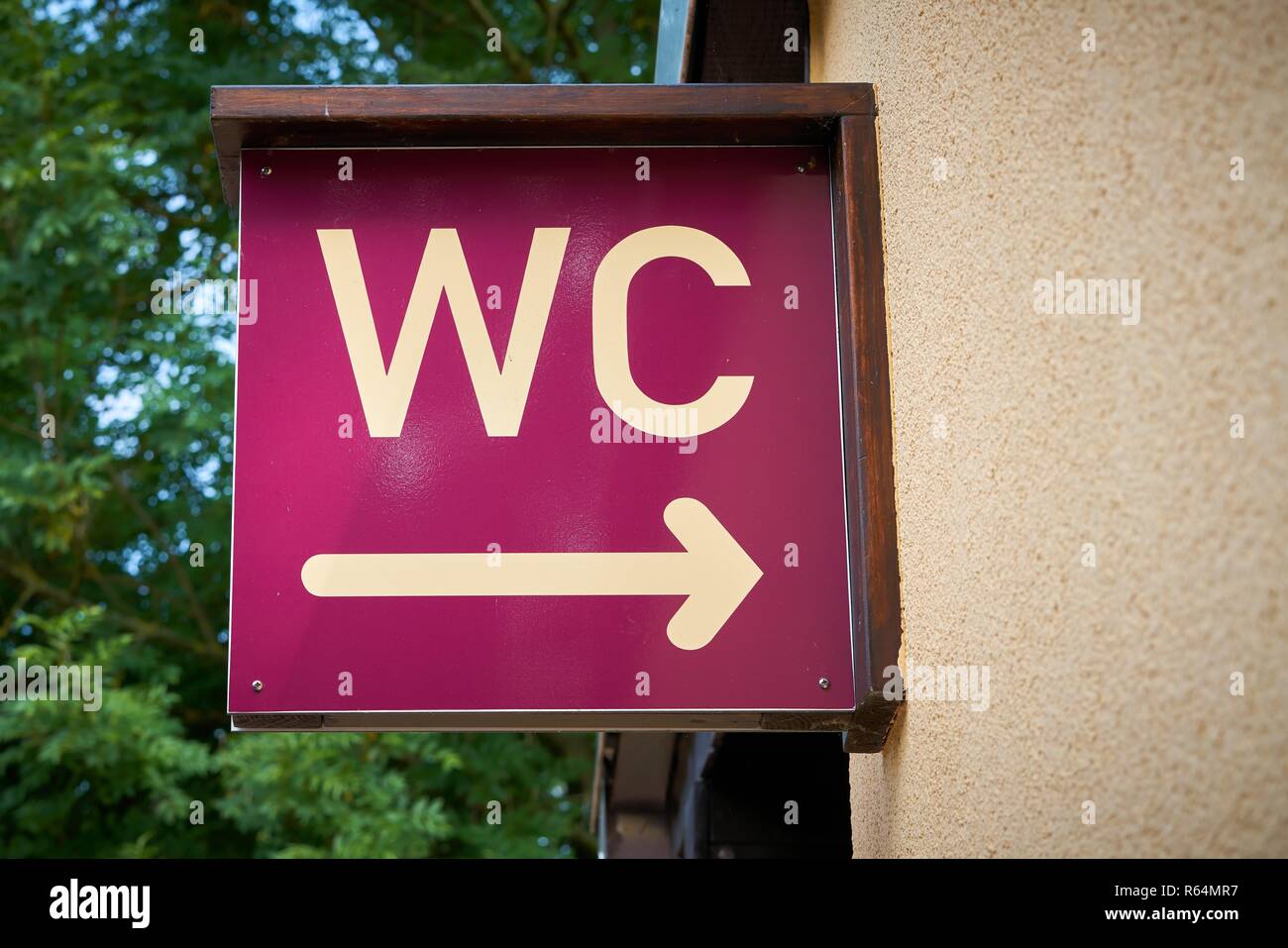 reference to a public toilet on the facade of a house Stock Photo - Alamy