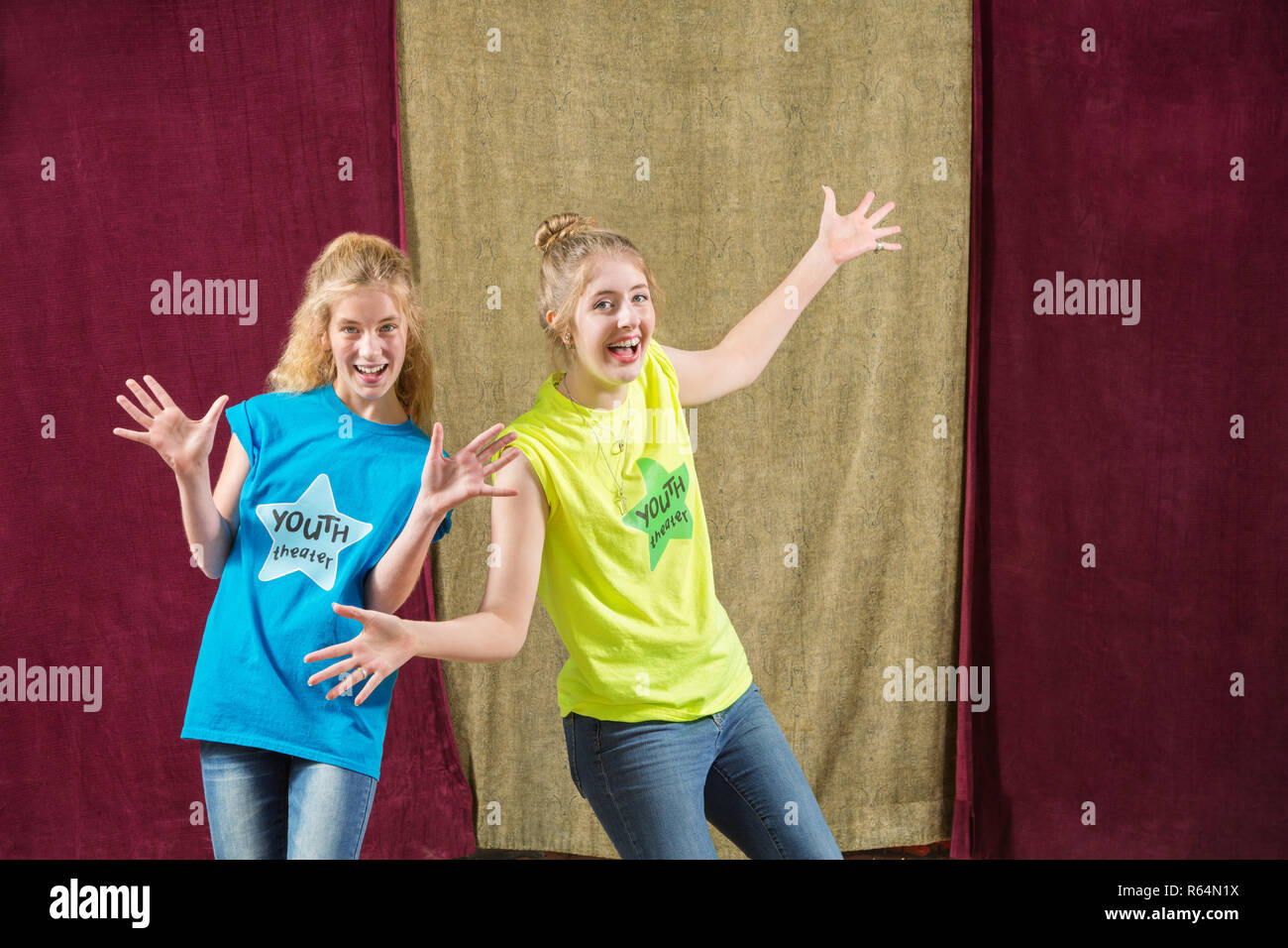 Two friends make silly gestures Stock Photo - Alamy