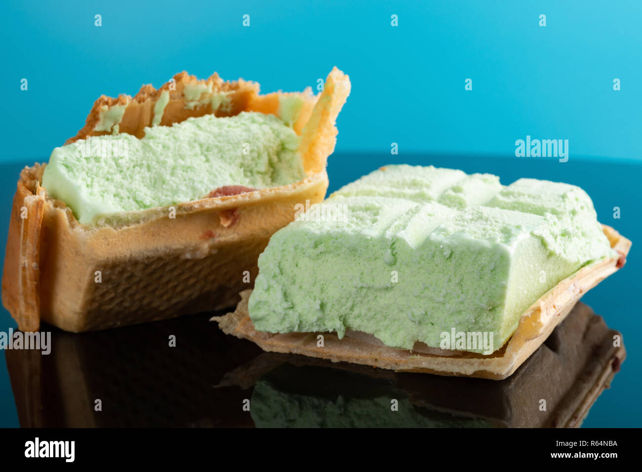 studio shoot of ice cream block on blue with reflection Stock Photo - Alamy
