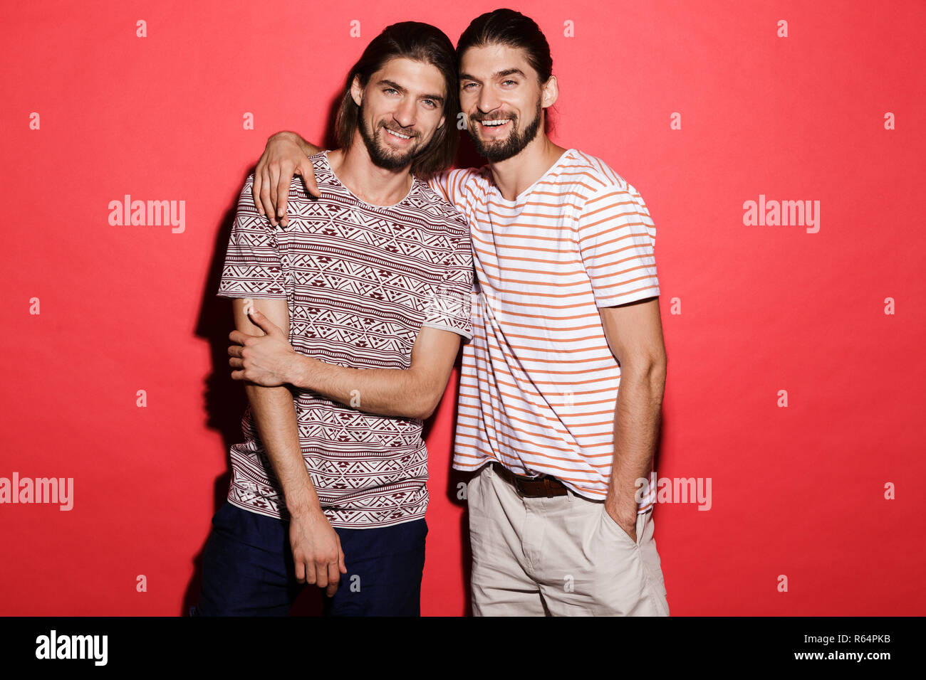 Twin brothers standing hi-res stock photography and images - Alamy