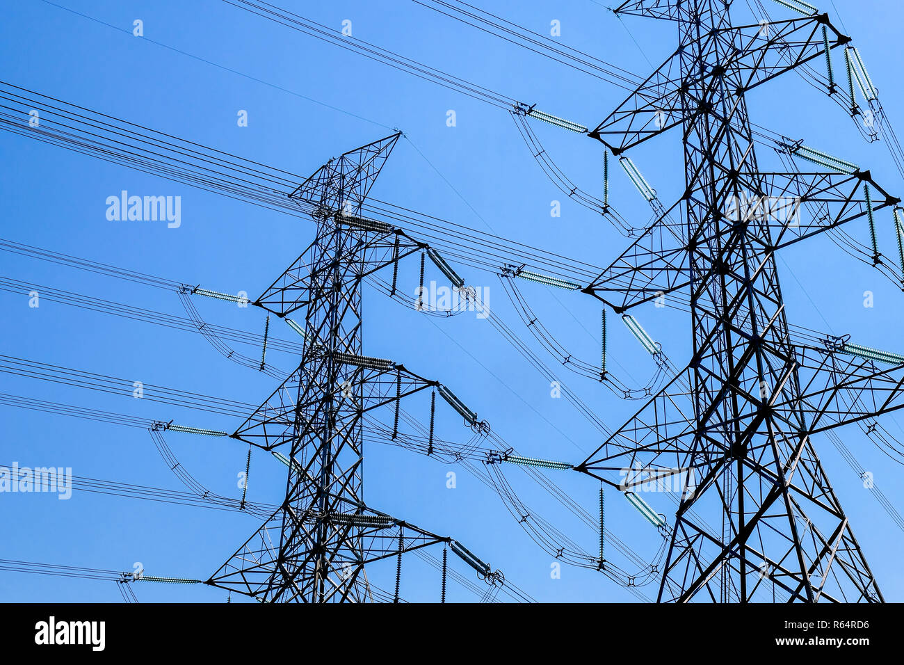 Electric Pylons background Stock Photo - Alamy