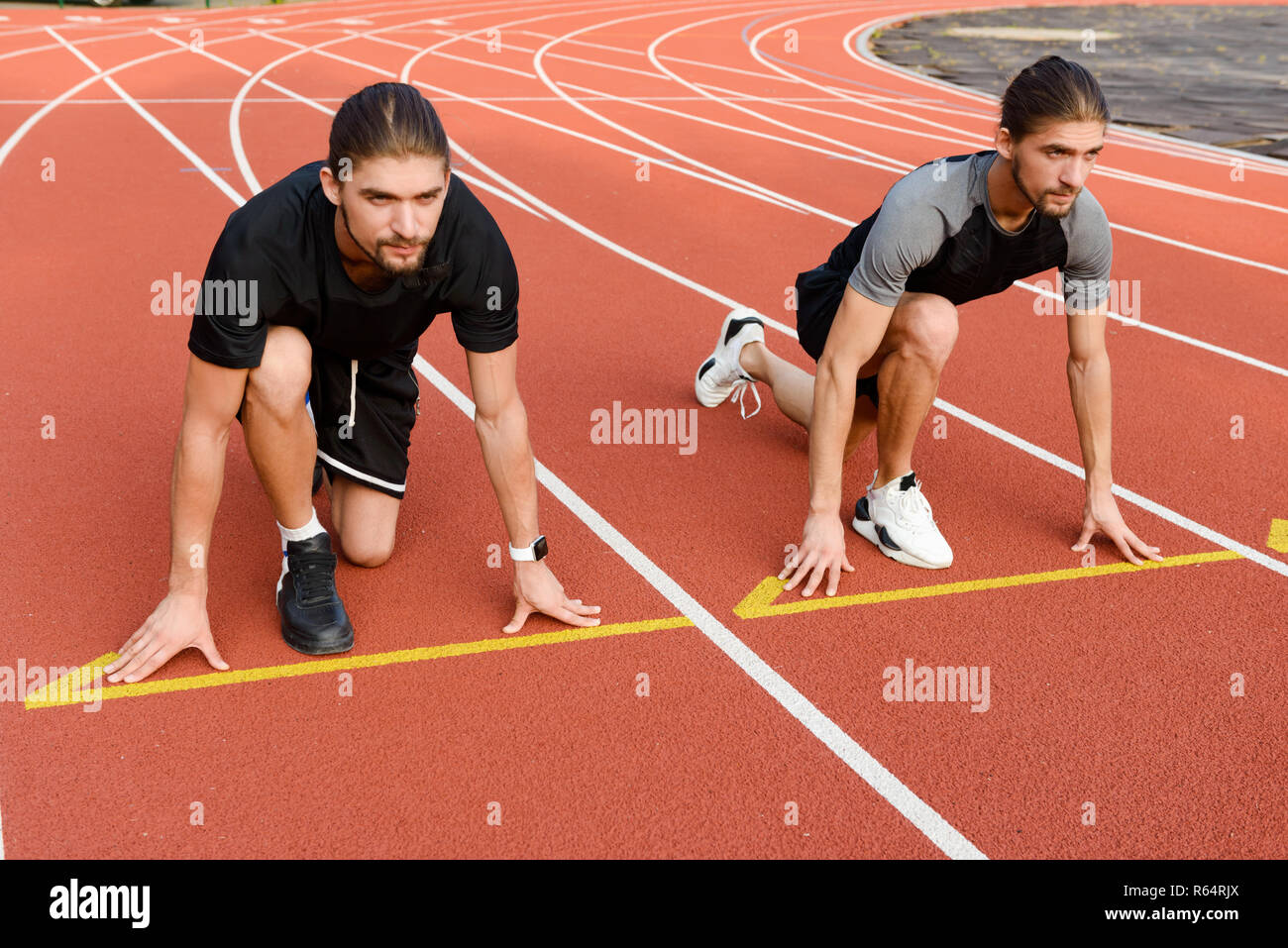 Male twins run hi-res stock photography and images - Alamy