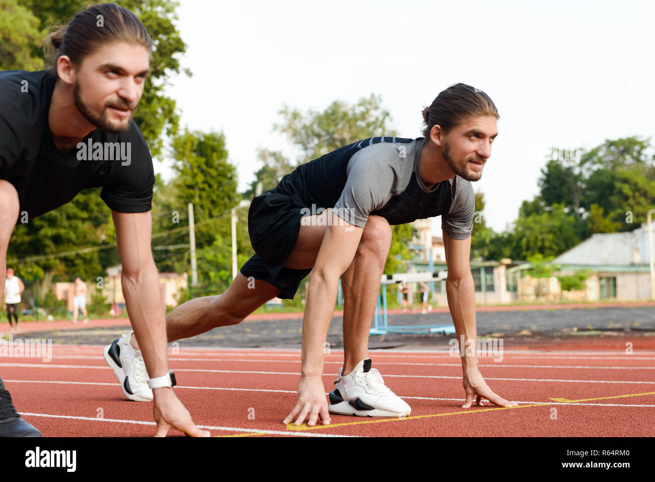 Male twins run hi-res stock photography and images - Alamy